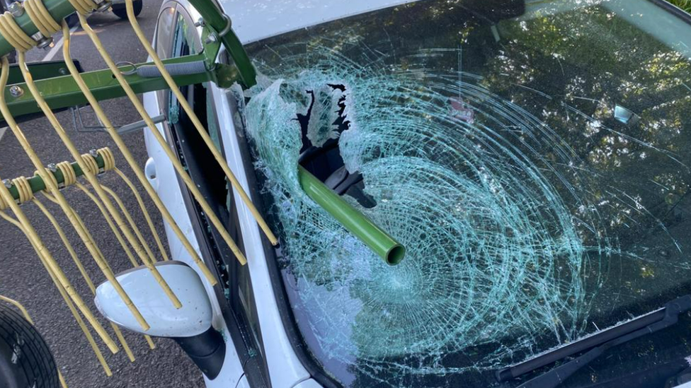 Lucky escape after metal pole impales windscreen - BBC News
