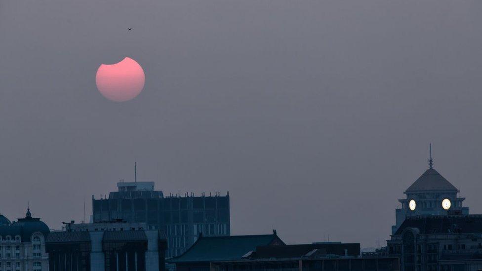 The first partial solar eclipse of 2019 dazzled skies in Eastern Asia ...