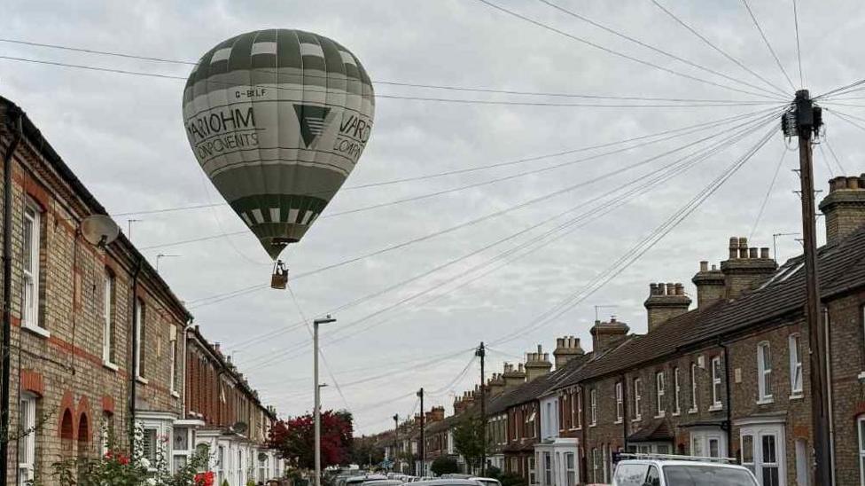 Bedford balloon pilot's 'split second decision' to land in street - BBC ...