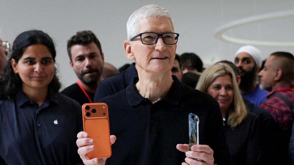 Apple claims 'tremendous' global uptake of latest iPhones - BBC News