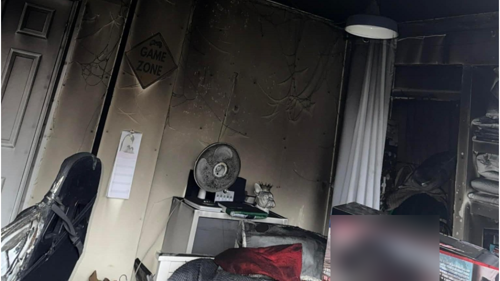 Toy car battery starts Christmas Day house fire in Monmouthshire - BBC News