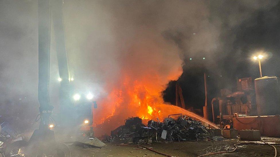 Firefighters tackle Bourne scrap metal yard blaze - BBC News