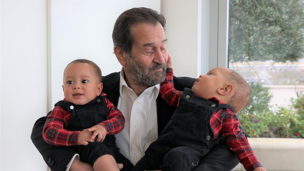 Twins meet 'miracle' surgeon who saved their lives - BBC News