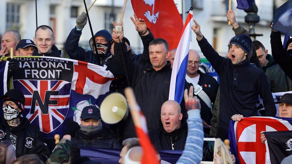 Far-right and anti-racism protesters clash in Dover - BBC News