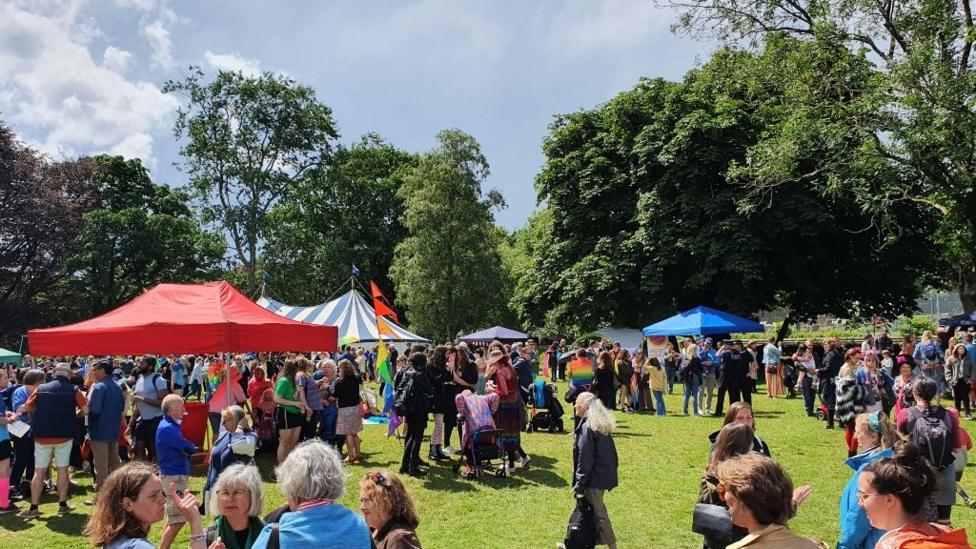 Rugby street hosts annual 80-metre Pride march - BBC News