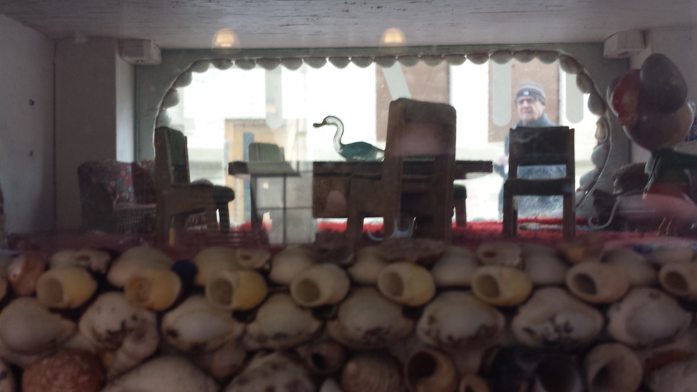 Curious seashell ship sculpture saved after campaign - BBC News