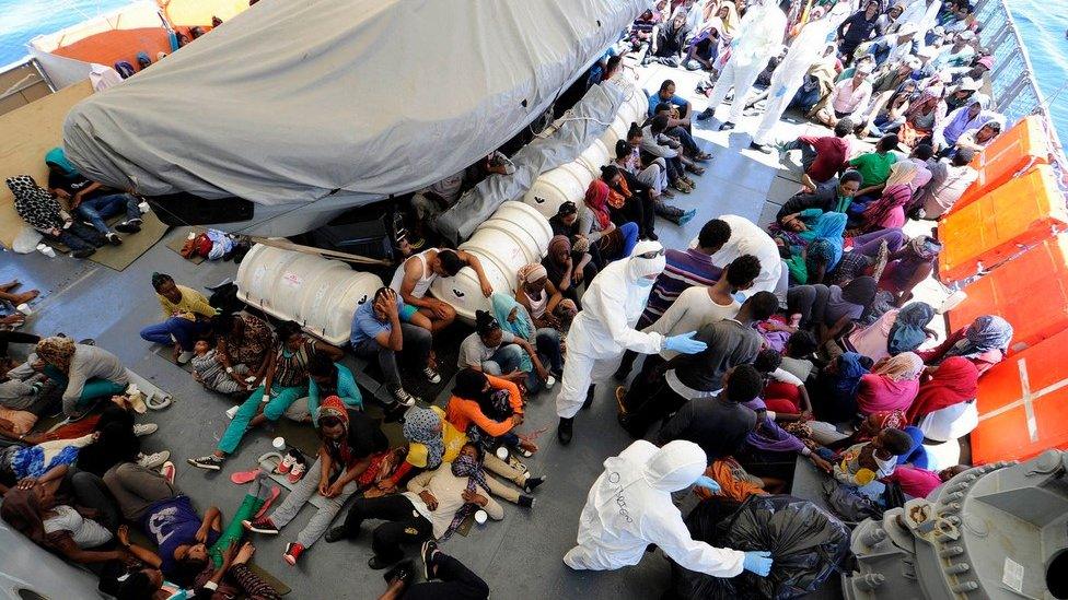 LÉ Róisín: Irish naval ship rescues 371 people from three boats - BBC News