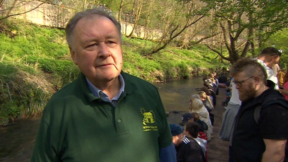 Hundreds turn out to enjoy annual duck race near Bristol - BBC News