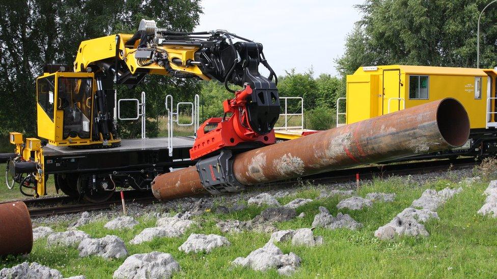 'Factory on wheels' delays rail electrification by a year - BBC News
