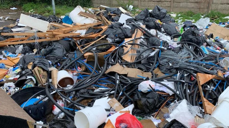 Telford: Bungling fly-tipper caught dumping washing machine - BBC News