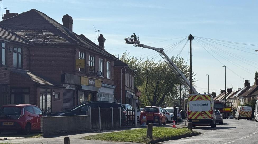 Fire breaks out in roof space above terraced shops in Alvaston - BBC News
