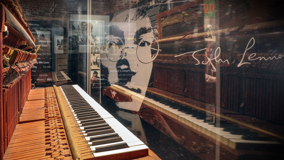 Beatle John Lennon's last piano played for first time in decades - BBC News