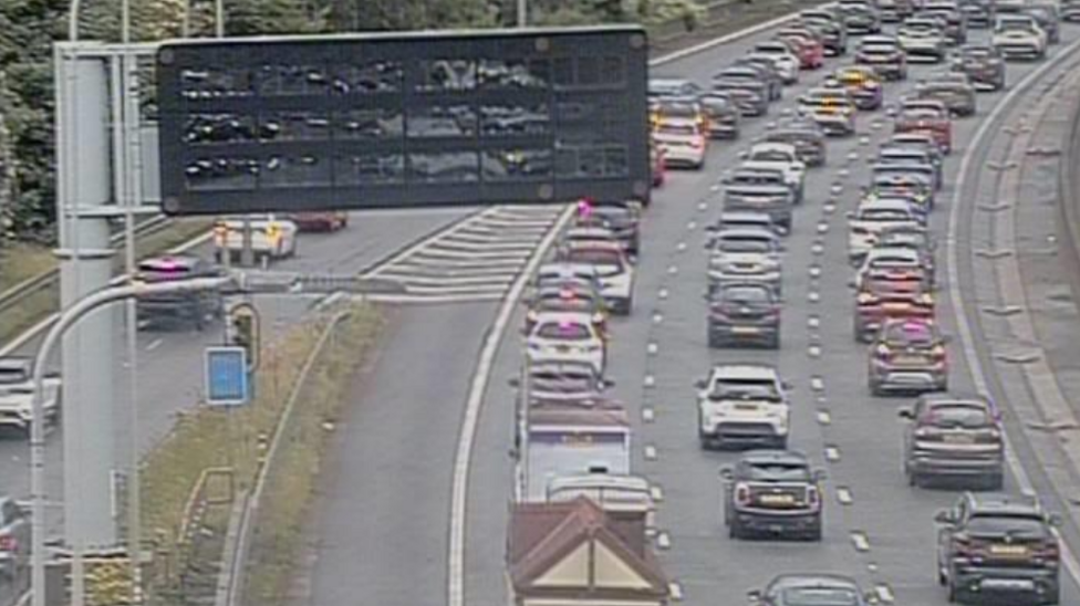 M60: Fatal crash closes motorway heavy with Oasis gig traffic - BBC News