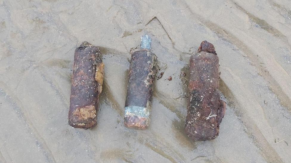 Unexploded WW2 mortar rounds destroyed at Walton beach - BBC News