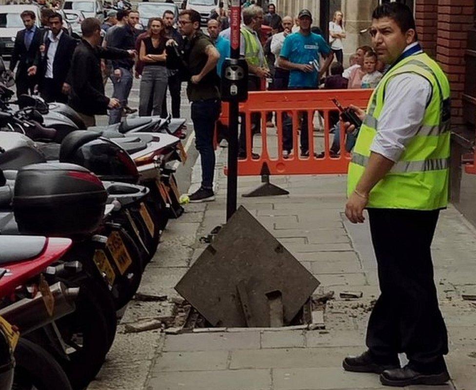Pavement 'explodes' in Blackfriars injuring woman - BBC News