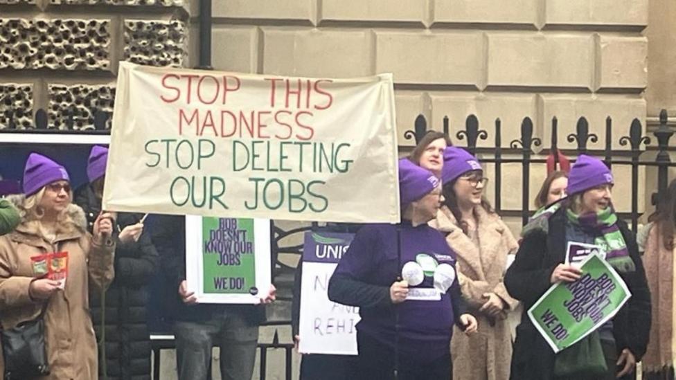 Protest over plans to change social care jobs at council - BBC News