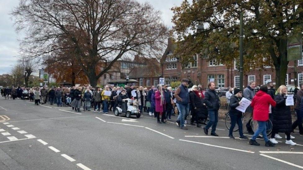 Second protest held over planned Rugby hospital ward closure - BBC News
