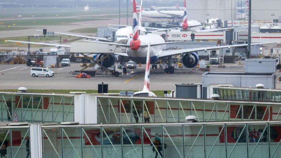 Build Heathrow rail link to stop 'ridiculous' journeys - MP - BBC News