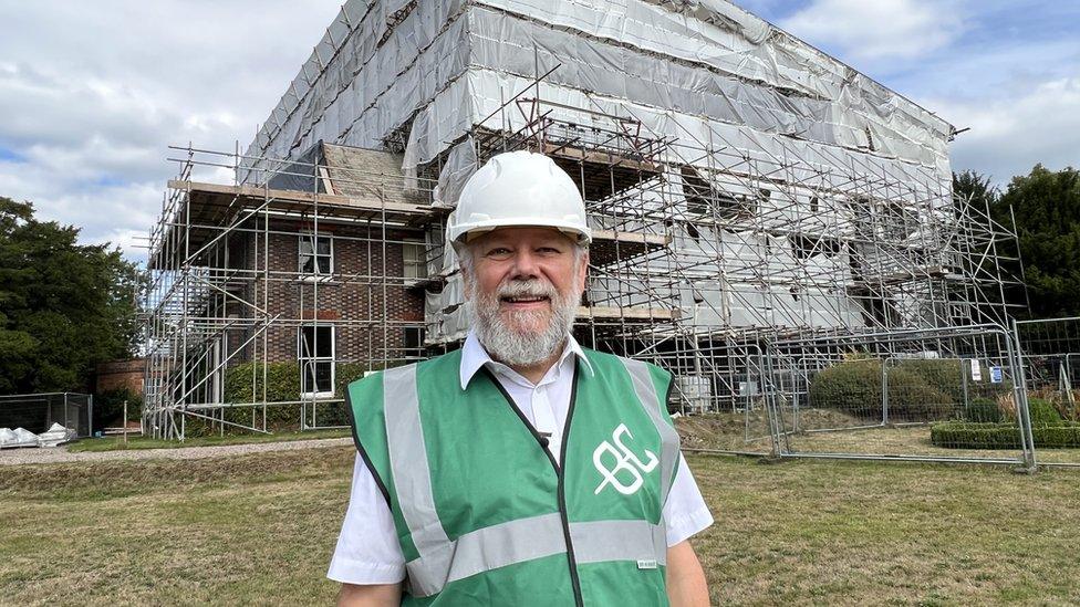 Initial rebuild nears end at fire-hit Betley Court - BBC News