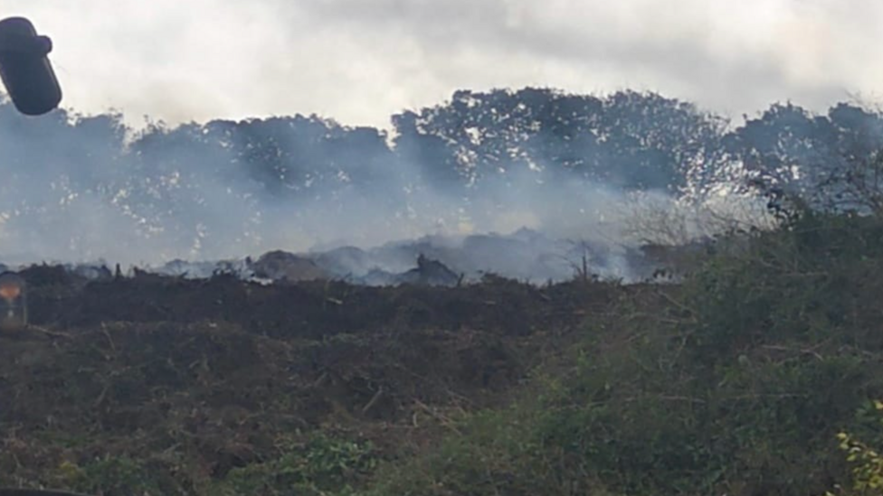 Cornwall compost fire still burning after more than a week - BBC News