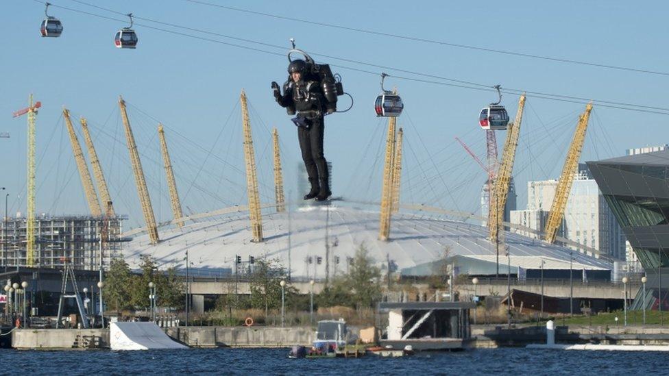 Jetpack pilot takes flight above London - BBC News