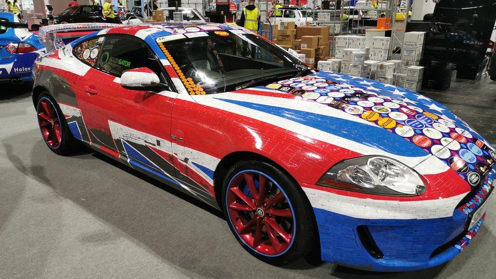 Jaguar sticker idea raises nearly £200k for children's charity - BBC News
