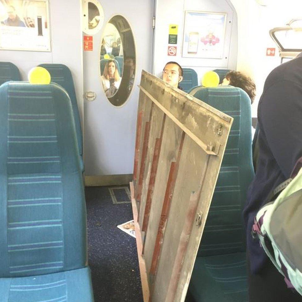 Train ceiling panel falls on London-bound passengers - BBC News