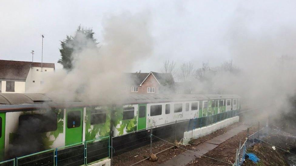 Ten evacuated as Kenilworth train catches fire - BBC News