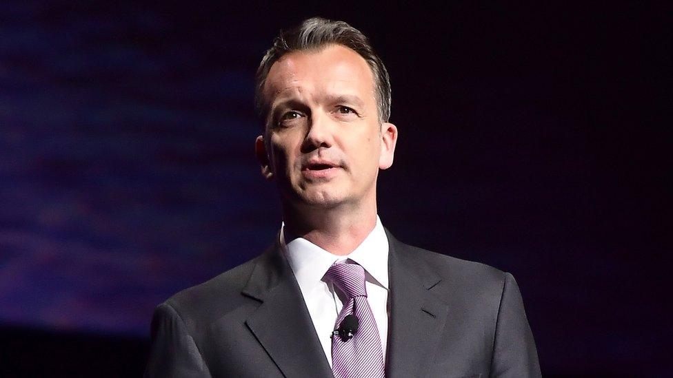 Top Disney movies boss steps down in shakeup - BBC News