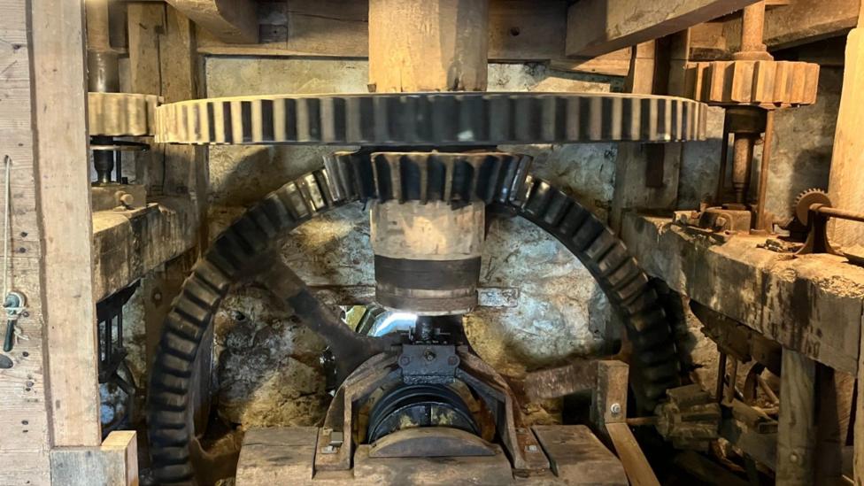 East Devon watermill reopens for first time in two years - BBC News