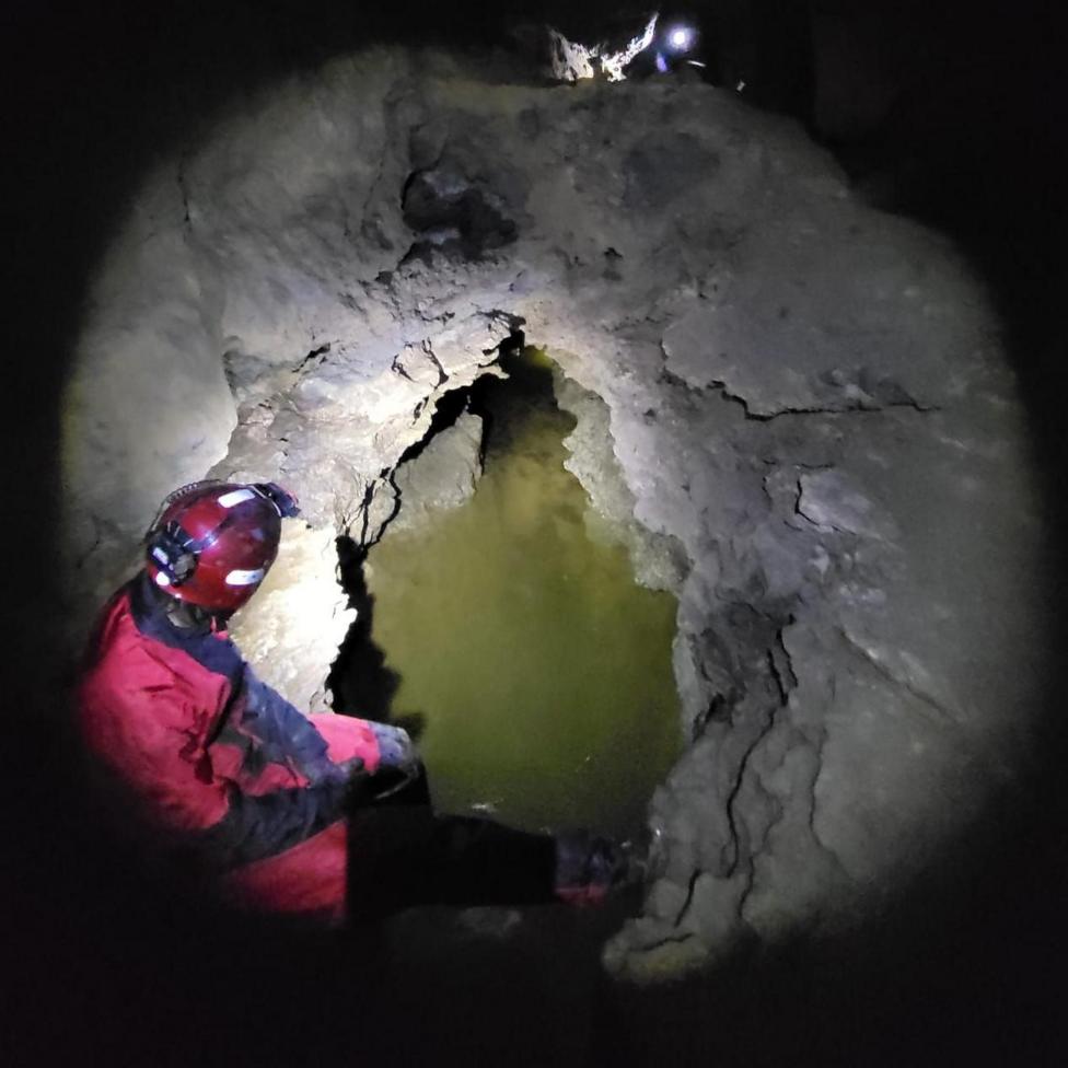 Caver rescued after getting stuck in Highland cave system - BBC News