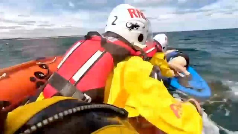 Boat runs aground after losing power near Wells Harbour - BBC News