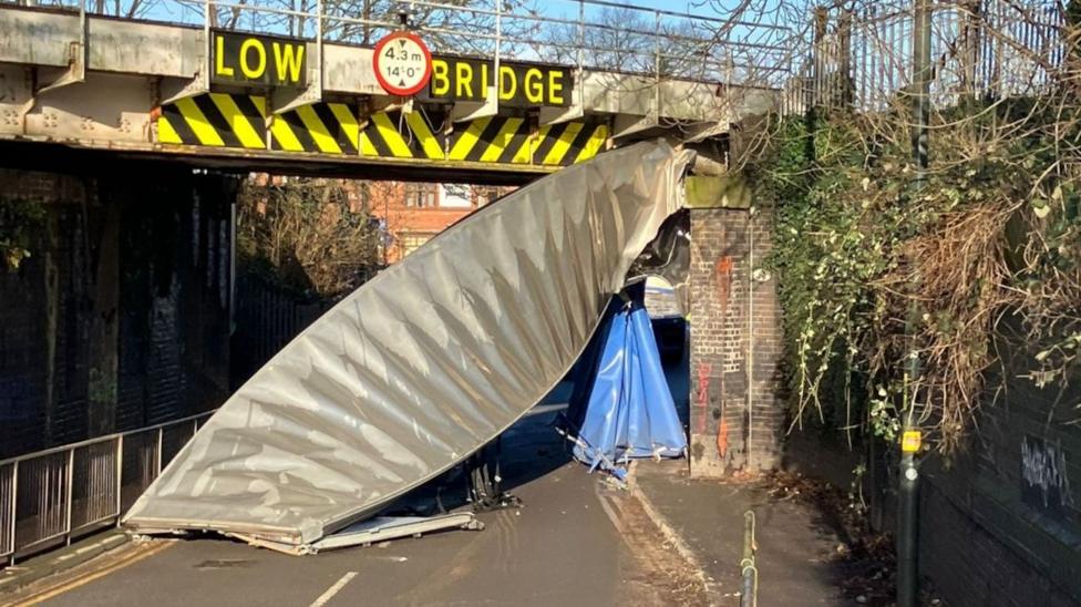Birmingham rail disruption after two lorries hit bridge - BBC News