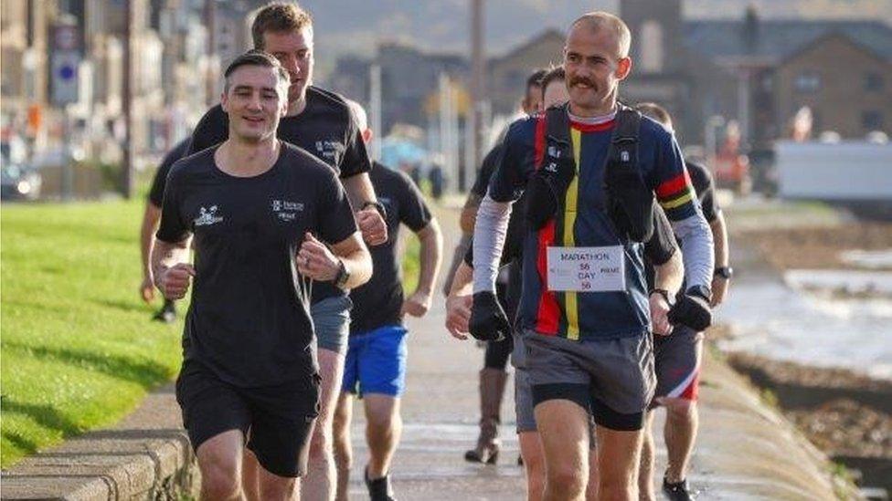 Devon marine given gift from King Charles III after marathon challenge ...