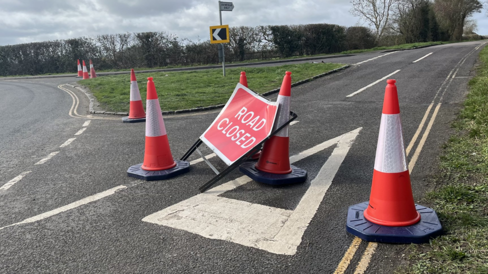 Roads closed and screens put up around RAF Fairford - BBC News