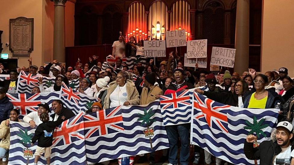 Crawley: Hundreds protest against Chagos Islands deal - BBC News