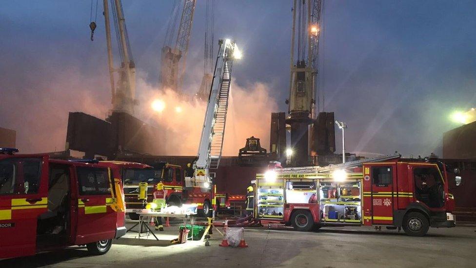 Crews tackle fire on board cargo ship in Southampton - BBC News