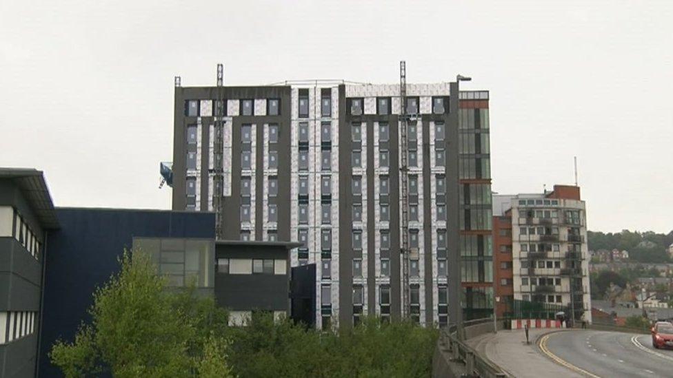 Cladding being removed from Lincoln student tower block - BBC News