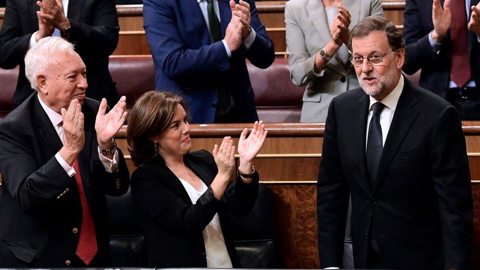 Mariano Rajoy wins vote to lead Spain minority government - BBC News