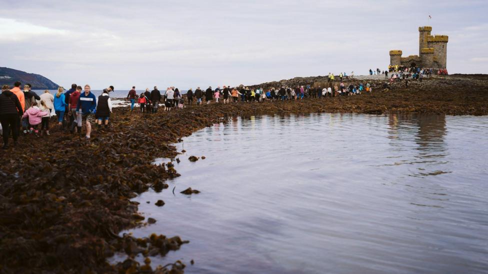 RNLI legacy celebrated during annual Tower of Refuge walk - BBC News