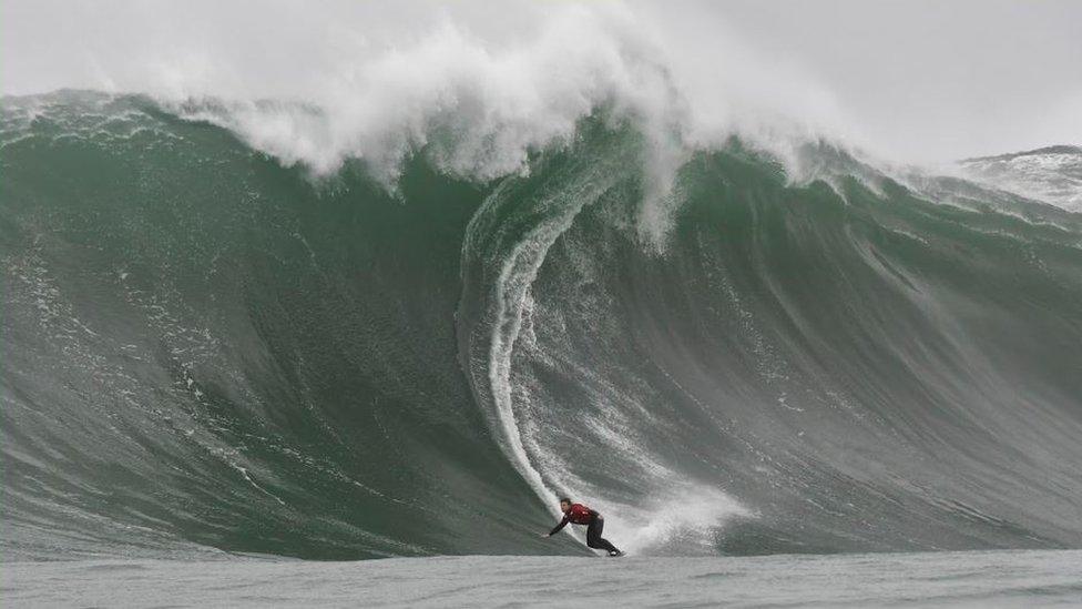 Mavericks: Surfers from around the world take on huge waves in ...