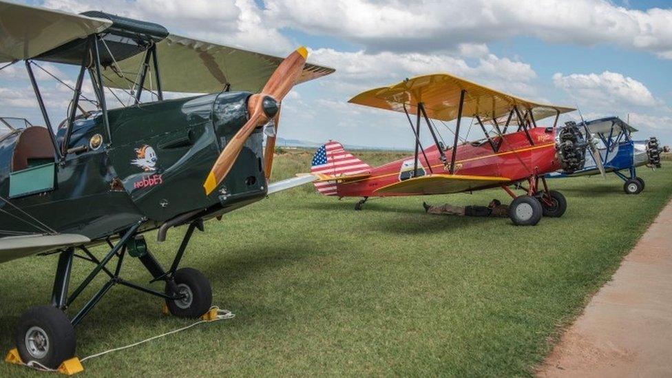 Vintage aircraft complete adventure-filled Africa rally - BBC News
