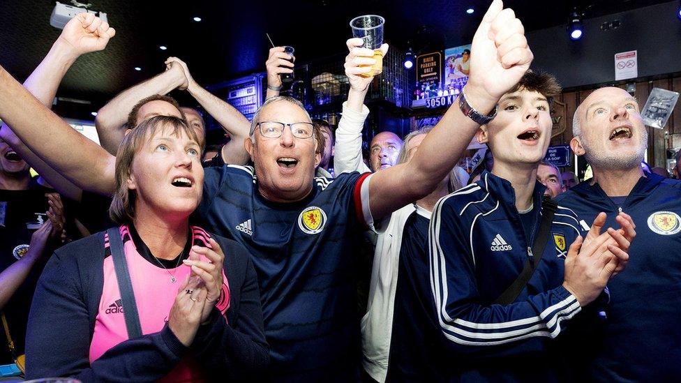 Tartan Army looks forward to Euro 2024 as Scotland qualifies - BBC News