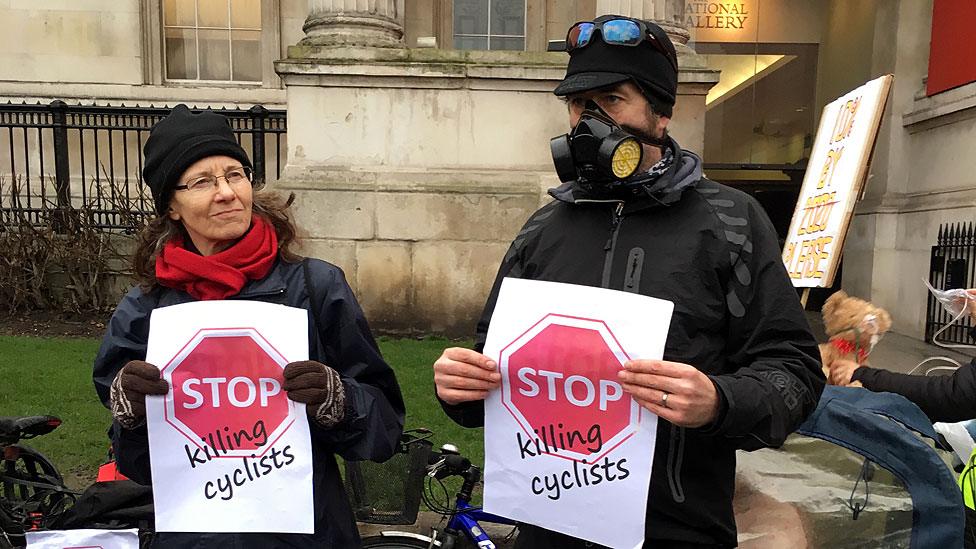 Cyclists stage 'die-in' protest in London for safer roads - BBC News