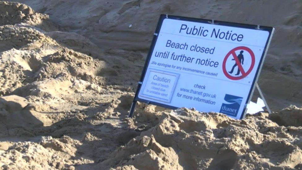 Signs on Margate beach warn public of sinking sand - BBC News