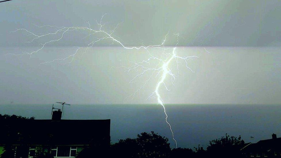 In pictures: Flash floods and flashes of lightning - BBC News