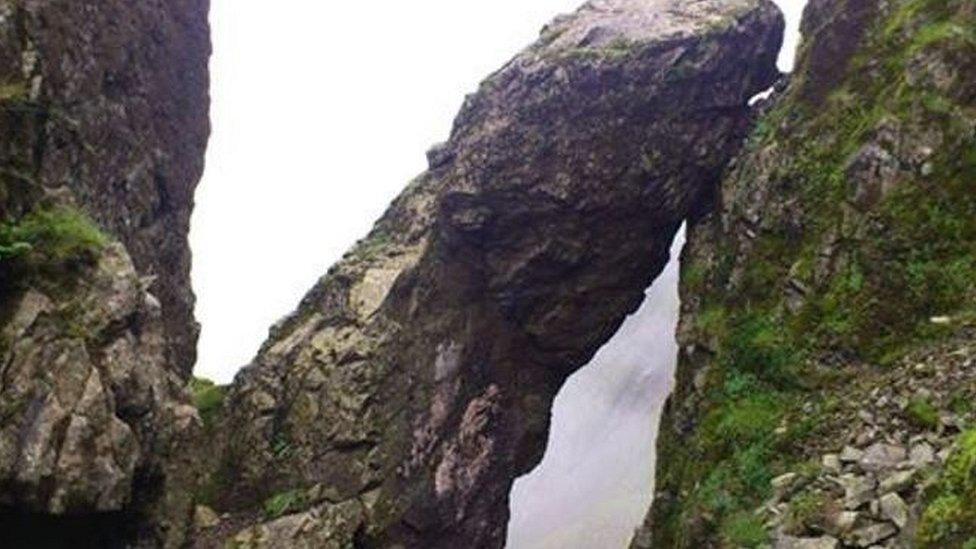 Lake District leaning boulder plunges down Lord Rake ravine BBC News