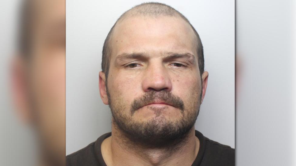 Police name wanted Leeds axeman as David Riley - BBC News