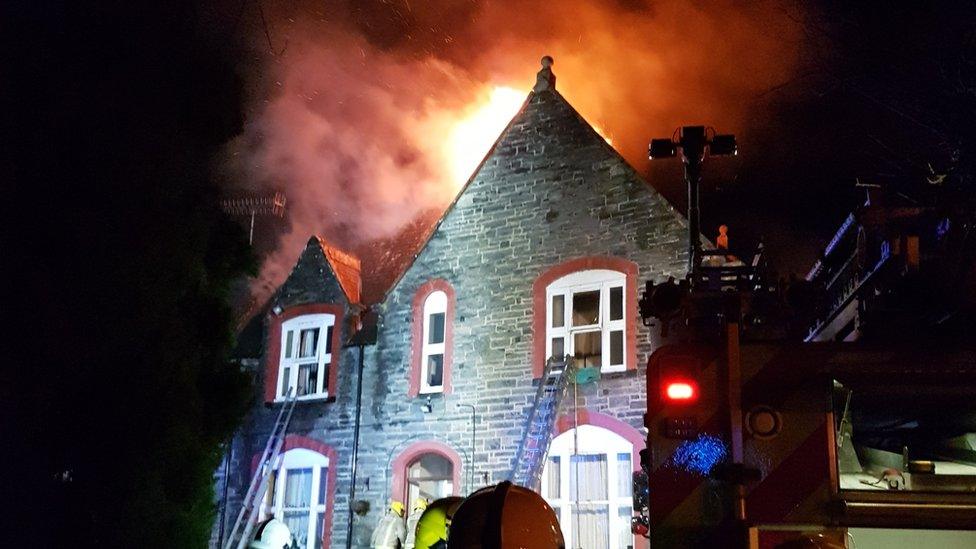Fire damaged Conwy care home community 'split-up' - BBC News