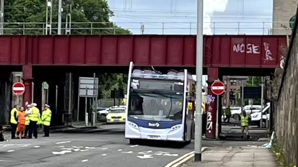 Child among injured after Glasgow bus roof torn off in crash - BBC News